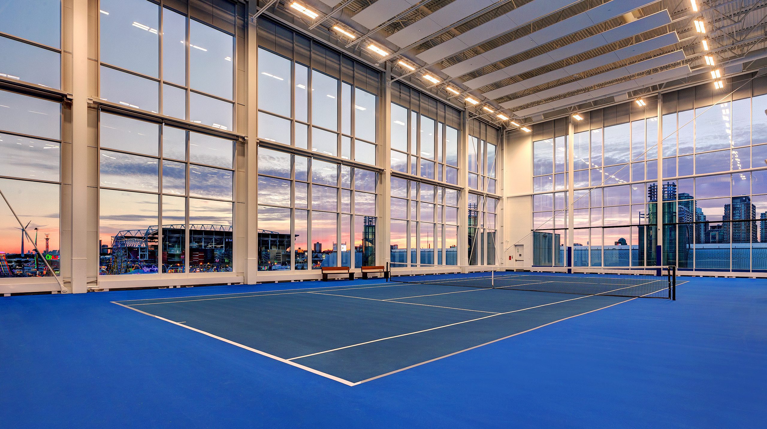 10X TO Athletic Club | Contemporary Fitness Club Design by NORR